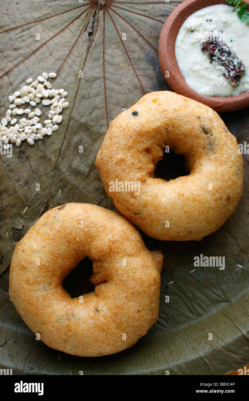 Vada is a South Indian snack shaped like a doughnut and made from dal ...