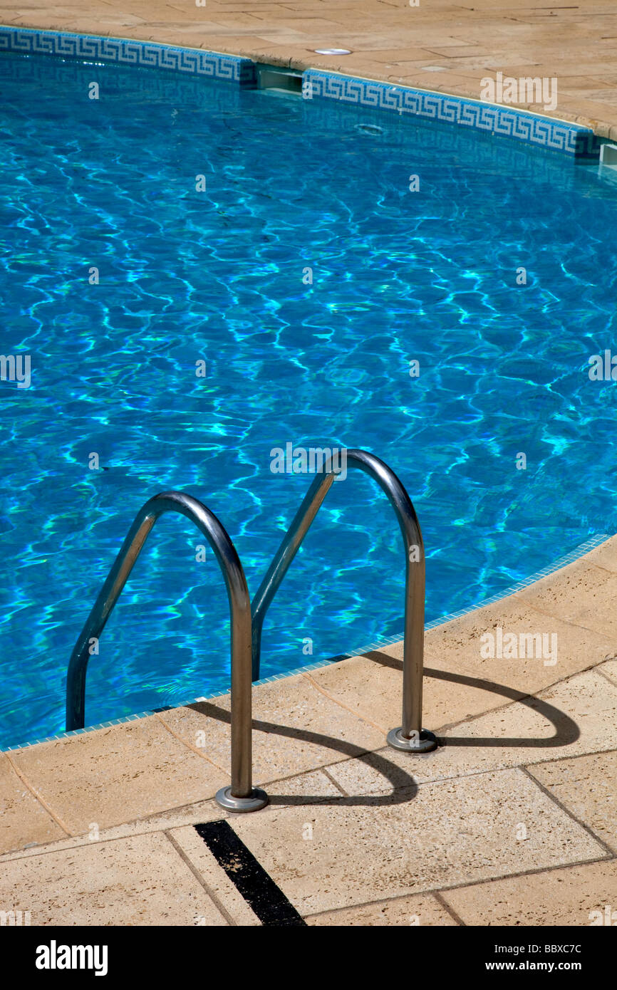 swimming pool blue water detail in summer time Stock Photo - Alamy