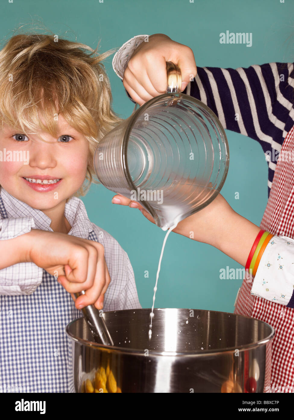 Having fun baking cakes hi-res stock photography and images - Alamy