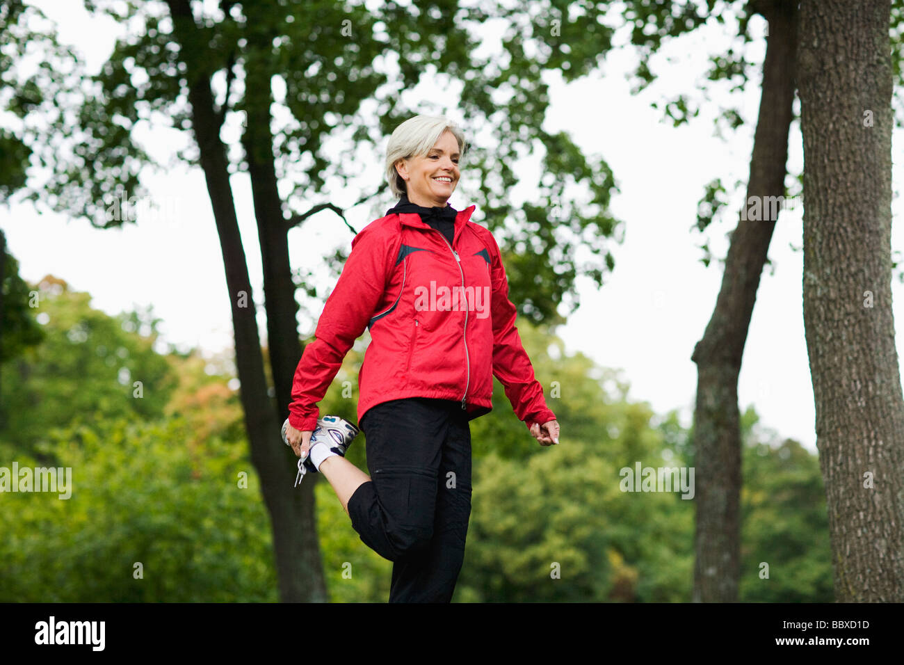 A woman doing stretching exercises Stockholm Sweden Stock Photo - Alamy