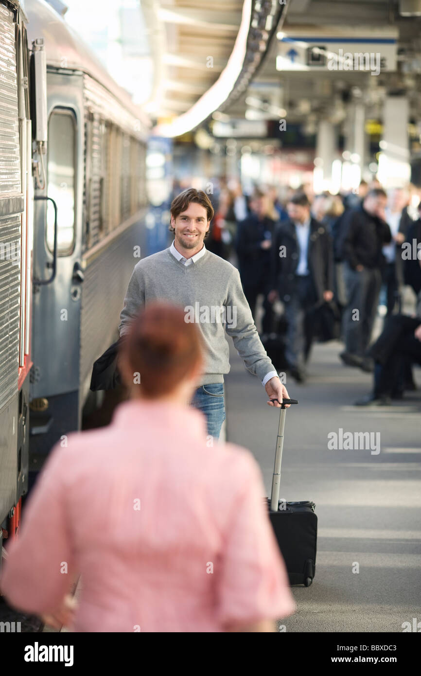 Couple meet on train hi-res stock photography and images - Alamy