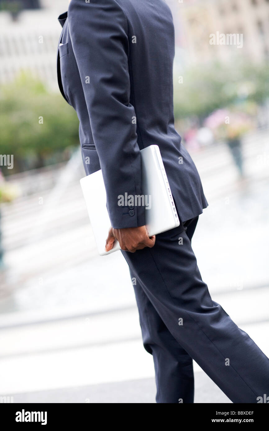 A man carrying a laptop Sweden Stock Photo - Alamy