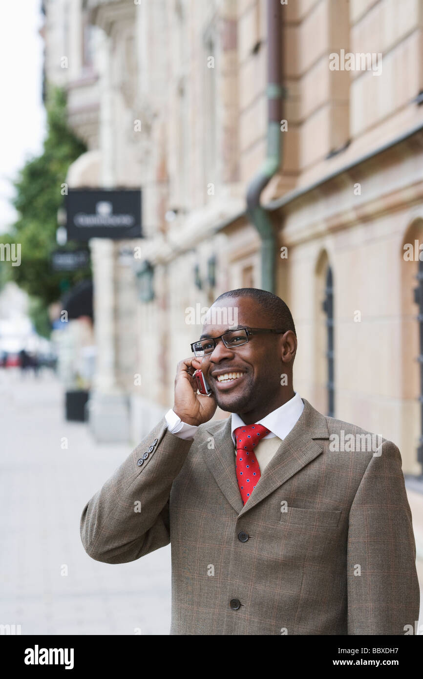 A man using a mobile phone Sweden Stock Photo - Alamy