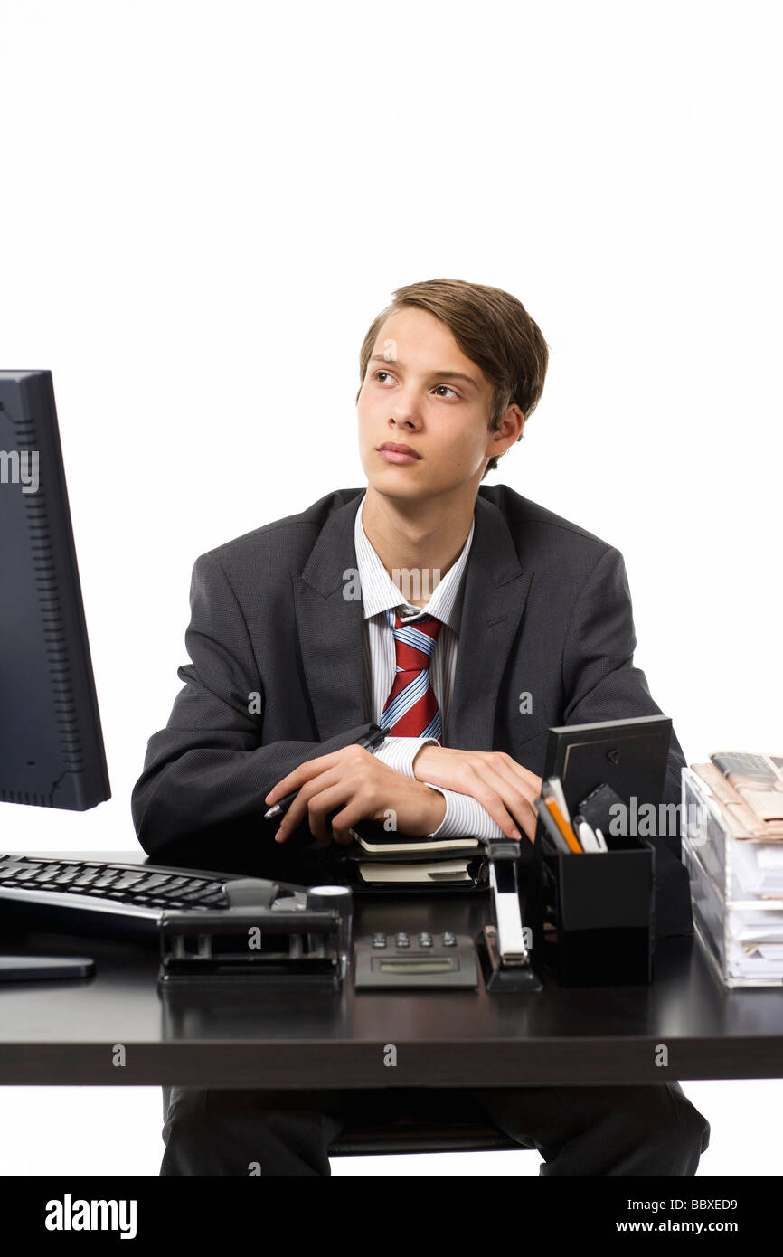 A teenage boy at an office Stock Photo - Alamy