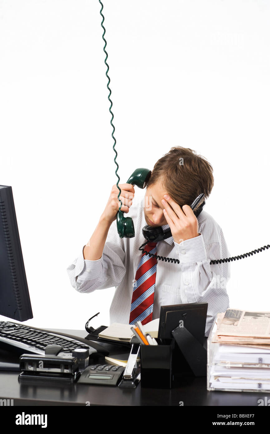 A teenage boy as a businessman at the office Stock Photo - Alamy