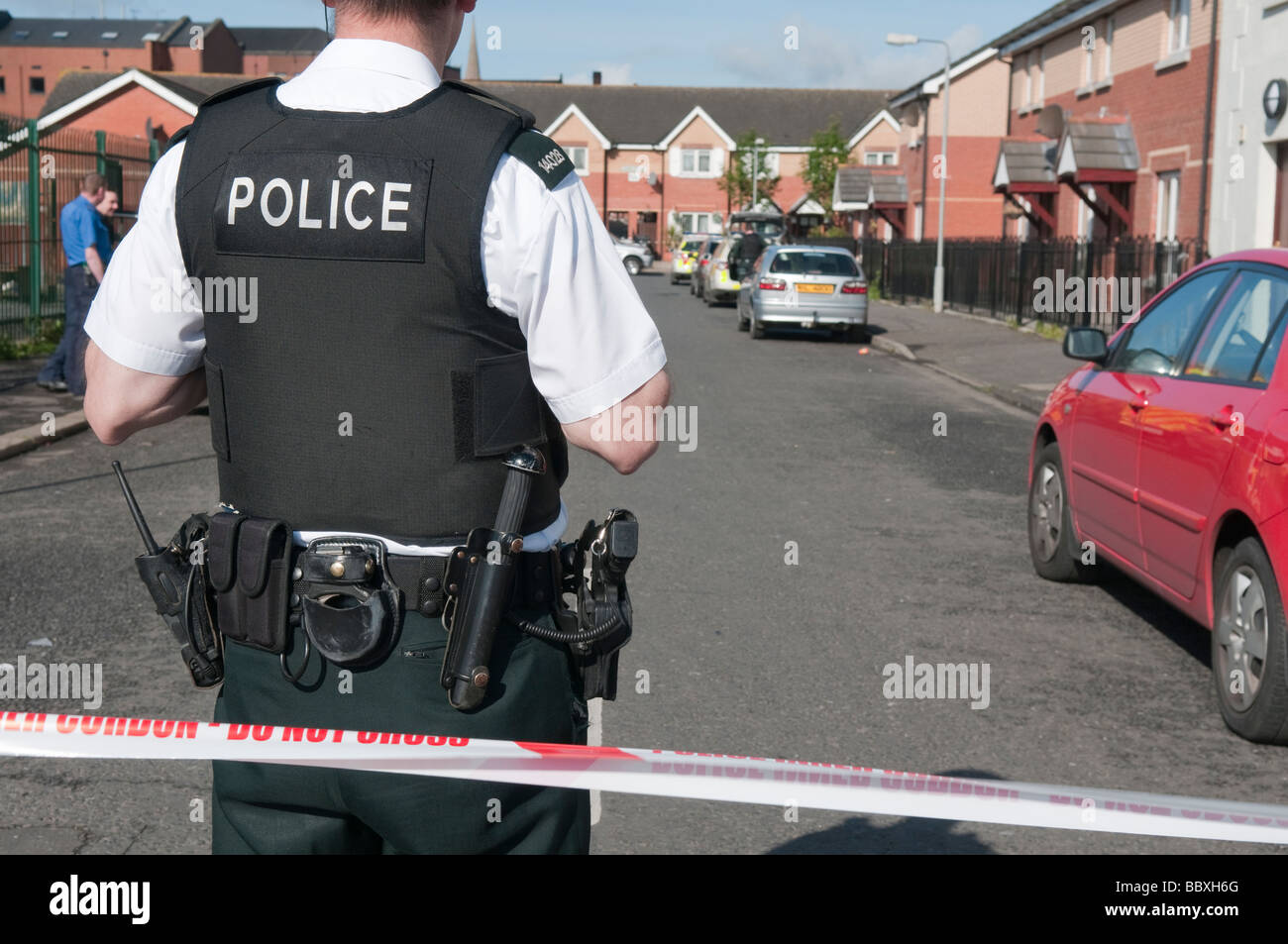 PSNI Police Officer at the scene of a crime, standing behind "Inner ...