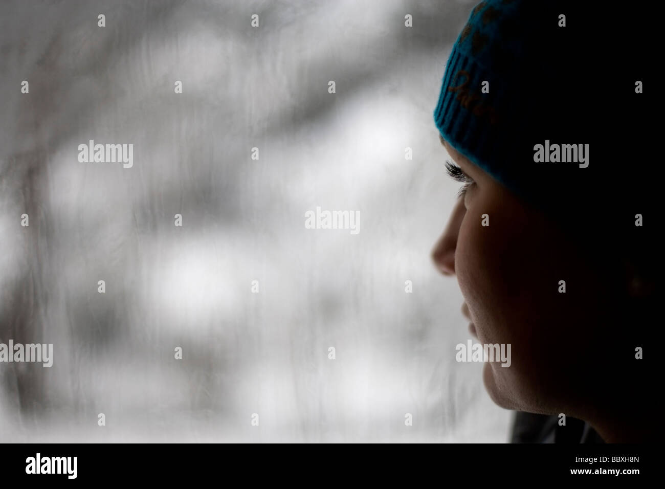 A woman looking out through a window Chamonix France Stock Photo - Alamy