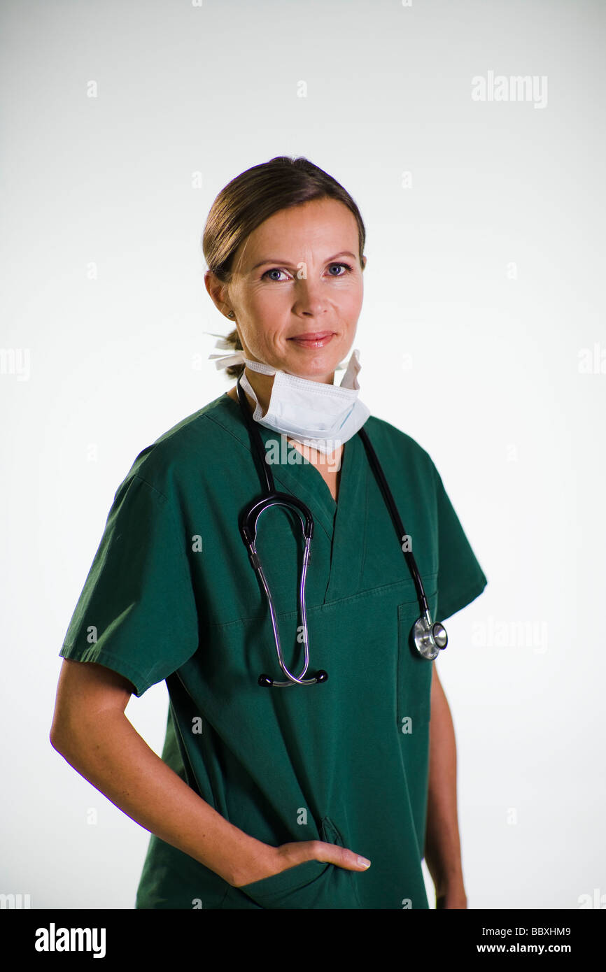 A doctor wearing a green uniform Stock Photo - Alamy