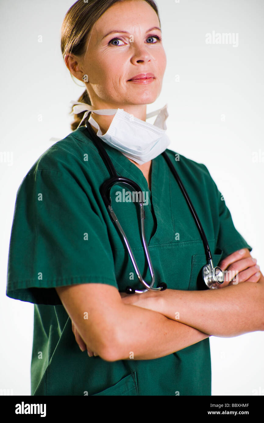 A doctor wearing a green uniform Stock Photo - Alamy
