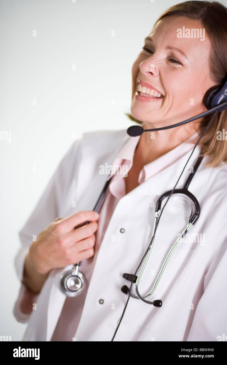 A docotor giving advice over the phone Stock Photo - Alamy
