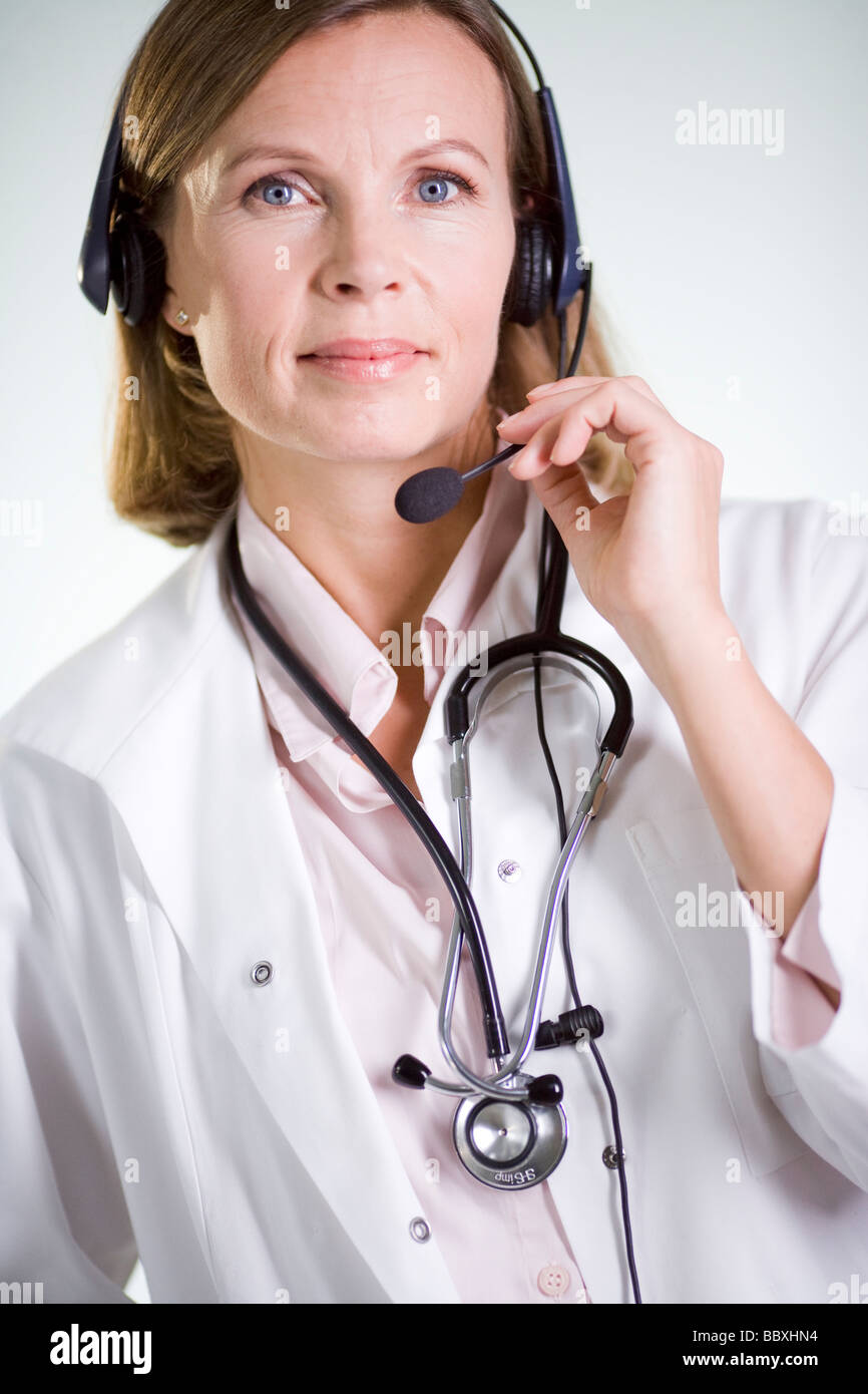 A docotor giving advice over the phone Stock Photo - Alamy