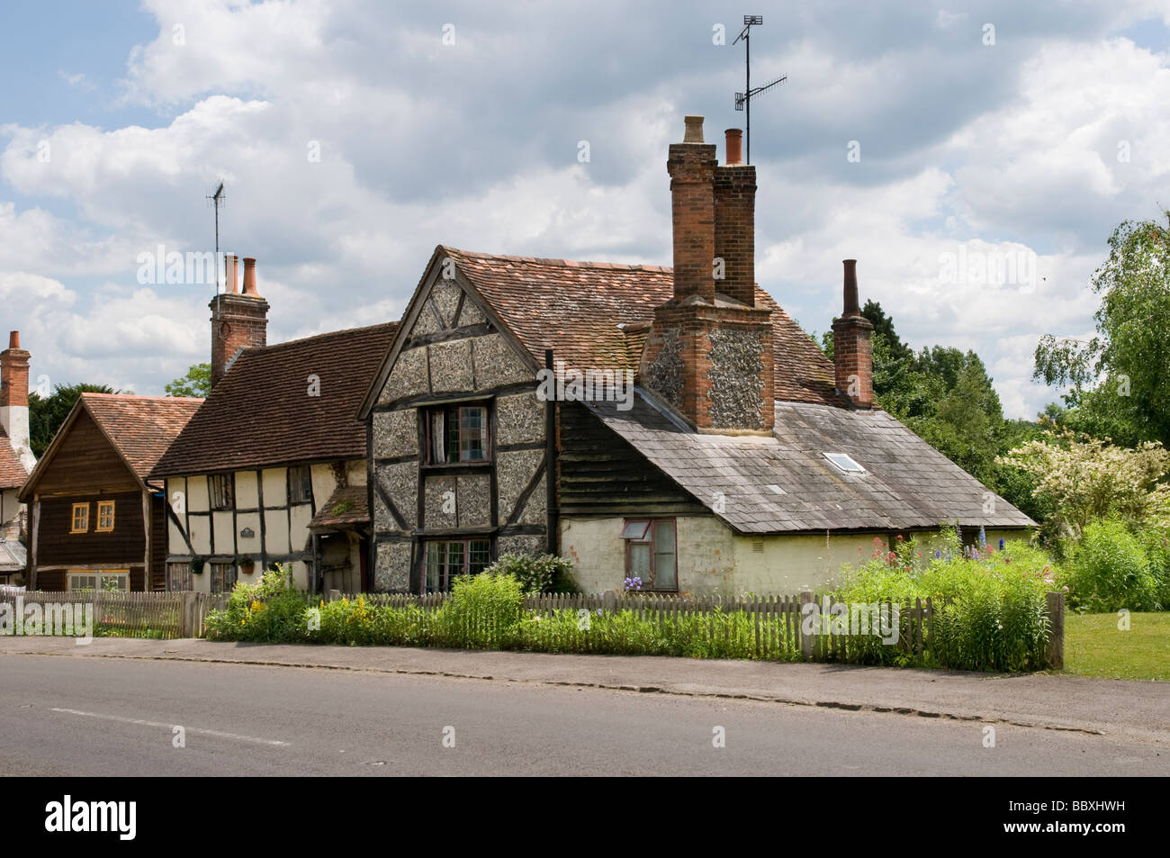 Old timber-framed roadside houses and cottages in Shere, Surrey ...