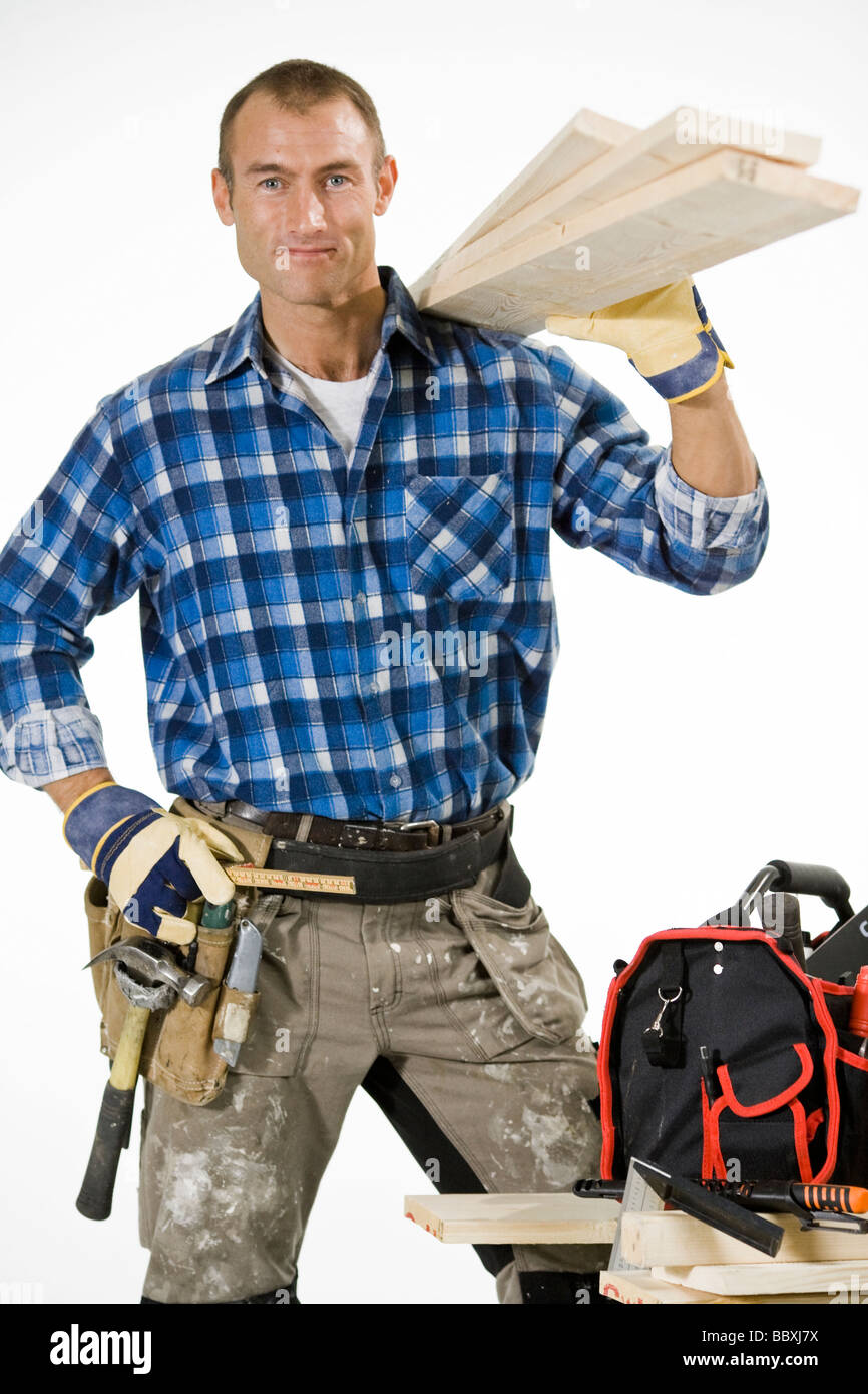 Carpenters carrying planks hi-res stock photography and images - Alamy