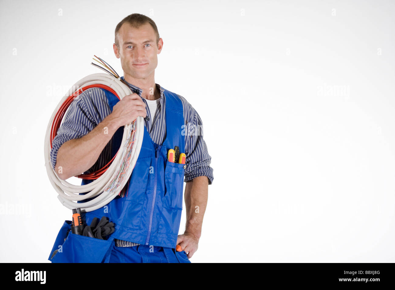 Portrait of an electrician Stock Photo - Alamy