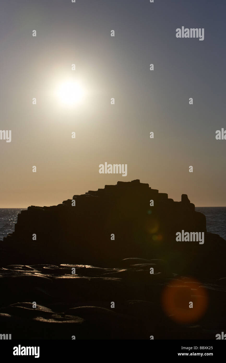 sun setting over the giants causeway county antrim coast northern ...