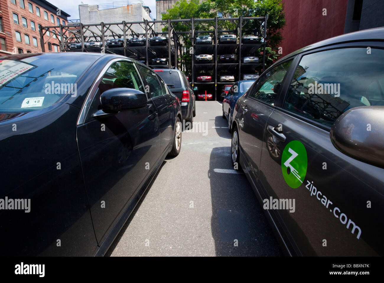 Zip Car at a Vertical Parking Lot in Manhattan New York Stock Photo - Alamy
