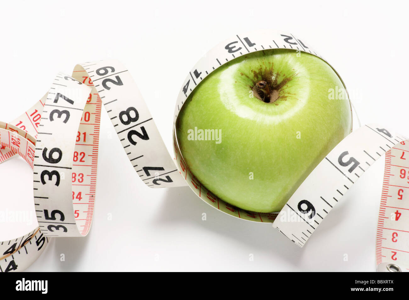 Green Apple and Tape Measure Stock Photo - Alamy