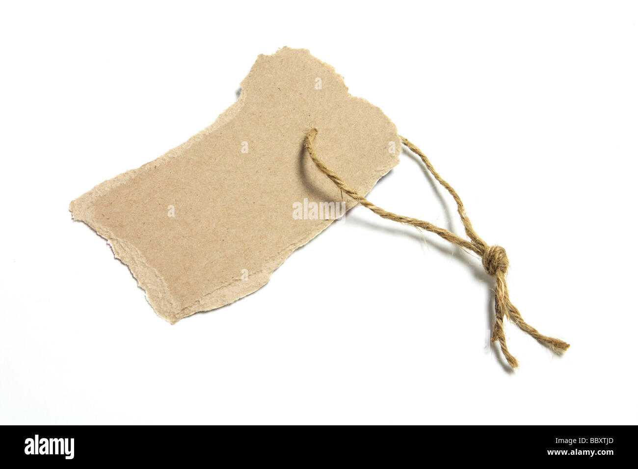 Torn Cardboard Tag Stock Photo - Alamy