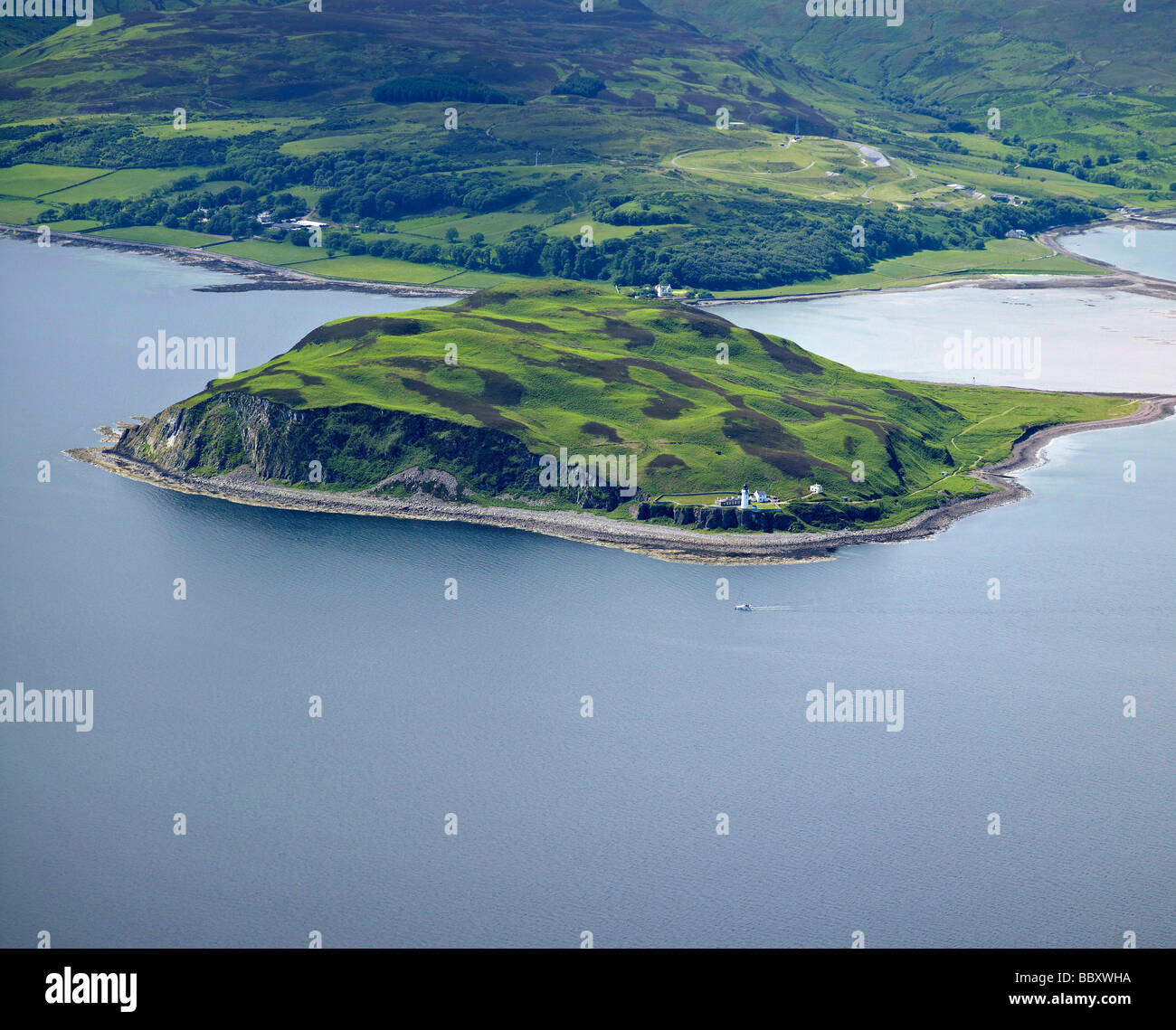 Davaar Islandand Lighthouse, at the entrance to Campbeltown Loch ...