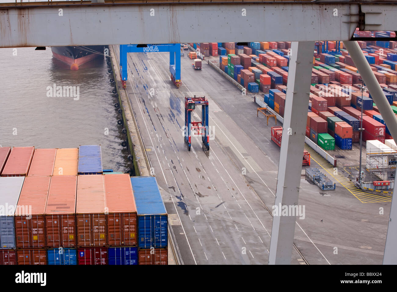 Containers onboard a docked containership await to be unloaded Stock ...