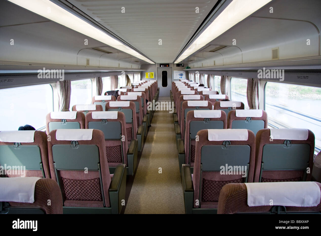 Japan. Interior of normal class carriage on the shinkansen, Bullet train, from back of carriage ...