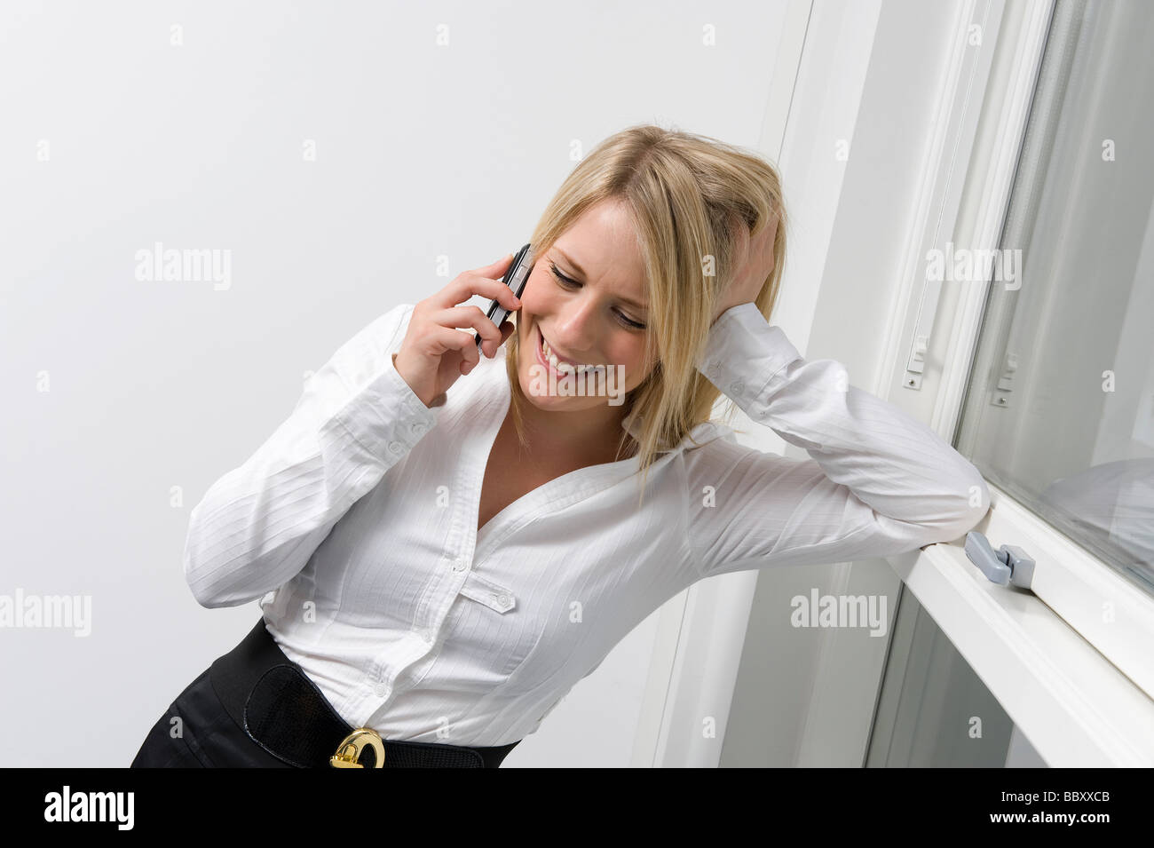 female office worker using mobile phone Stock Photo - Alamy