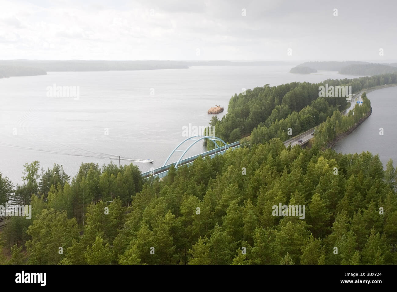 landscape highway between water with trees Stock Photo - Alamy