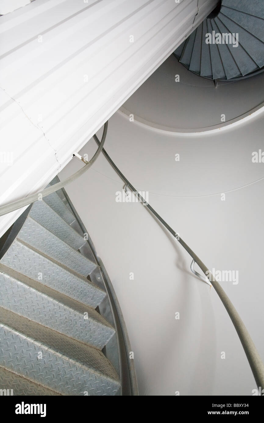 Modern ladder with metal steps in building Stock Photo - Alamy