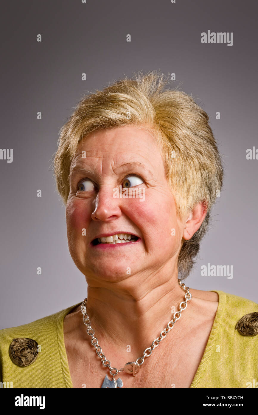 Cringing woman hi-res stock photography and images - Alamy