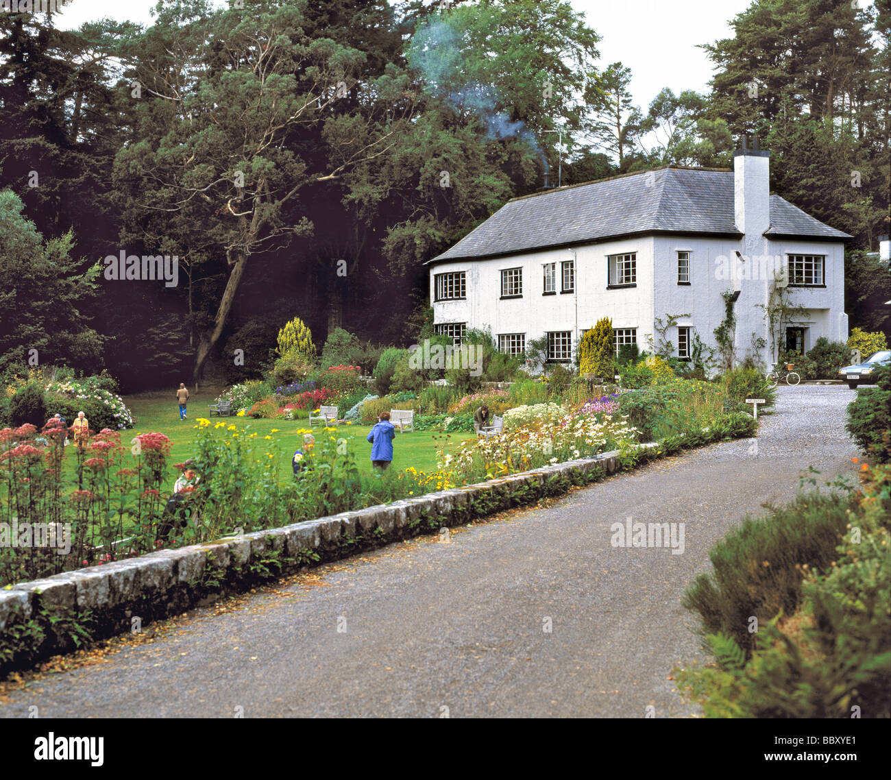 A white two story house abuts Inverewe Gardens in Scotland s Northwest ...