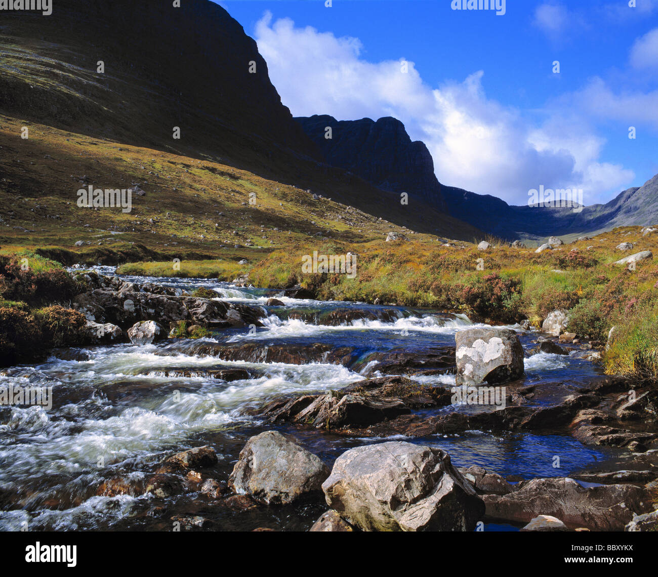 A stream rushes down from the mountains in Rannoch Moor in the Central ...