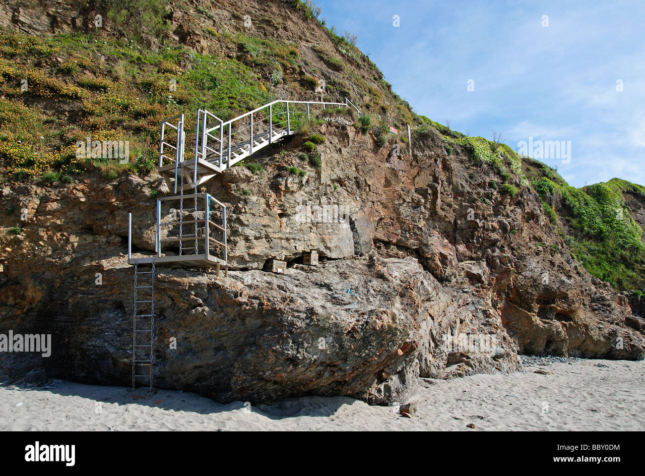 metal ladders used for access to the beach at prussia cove in cornwall ...