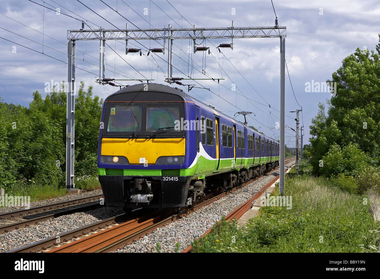 London Midland Class 321 No 321415 forms a London Birmingham NS service seen passing through ...