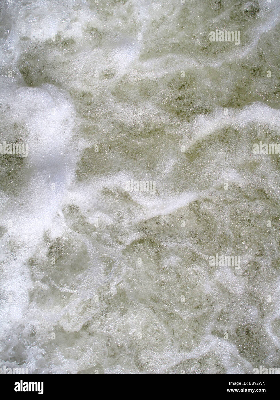 Water foaming at weir Stock Photo - Alamy