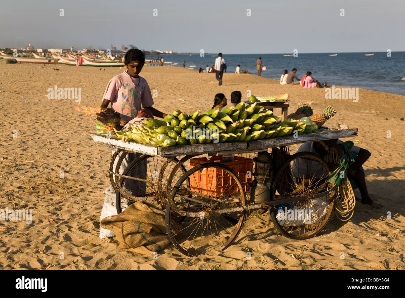 A man sells corn on the cob on Marina Beach in Chennai, India Stock ...