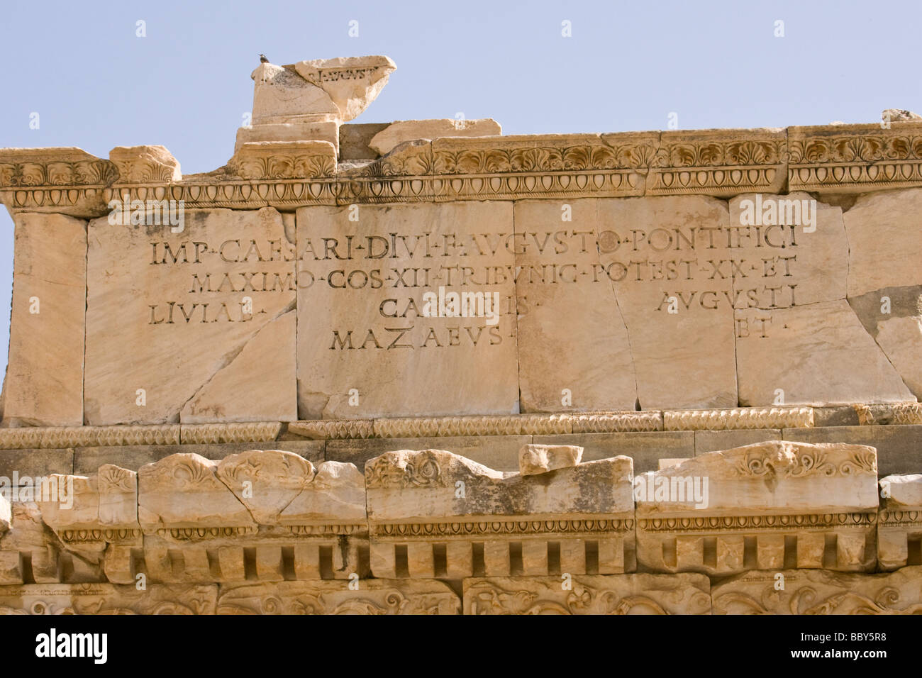 Tribute carved into an ancient roman gate at the Celsus library in ...