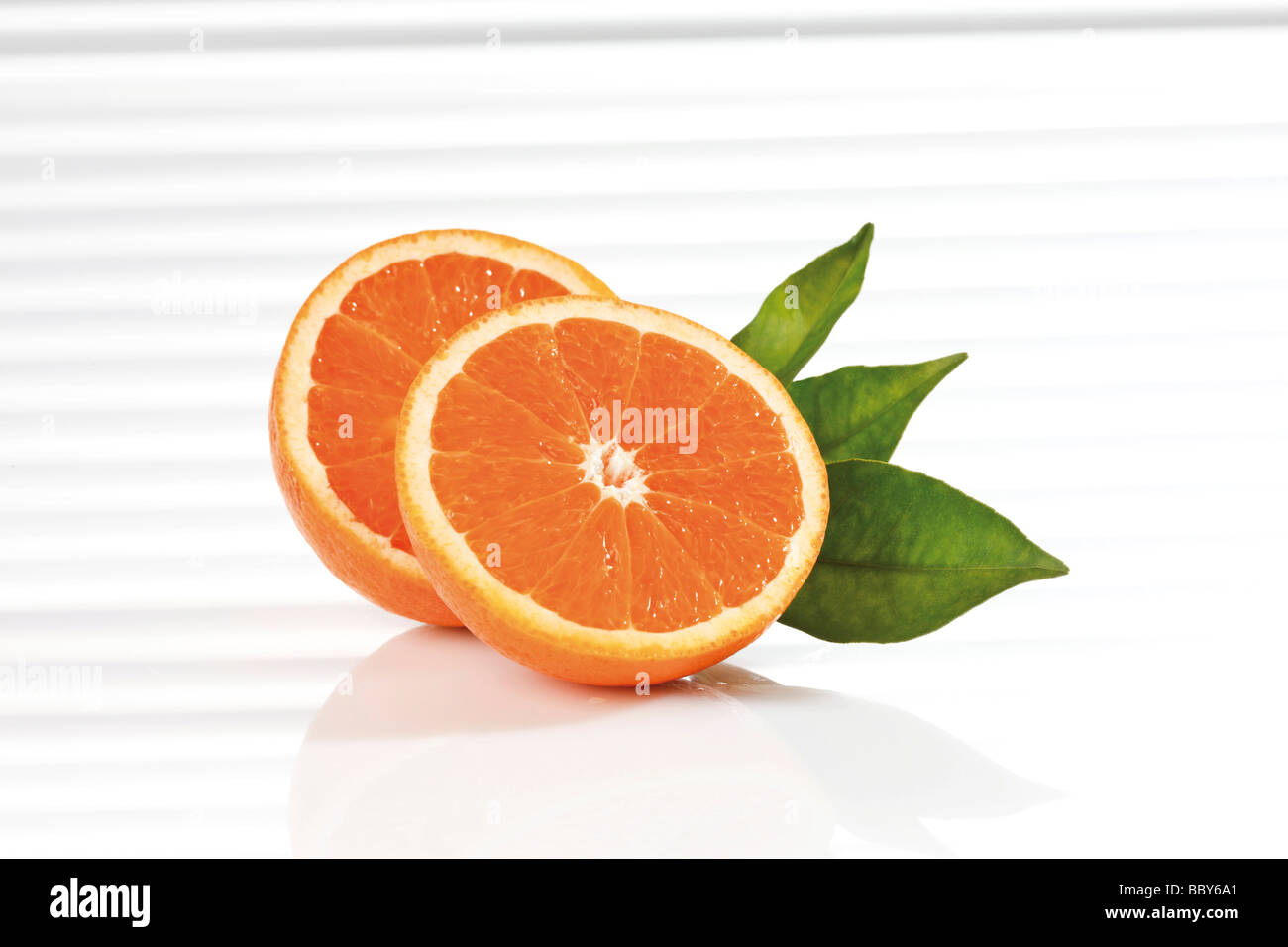 Two halved oranges hi-res stock photography and images - Alamy