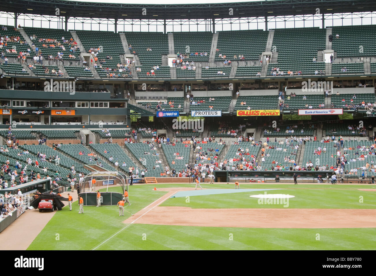 Grounds crew prepare baseball field for play at Oriole Park - Camden ...