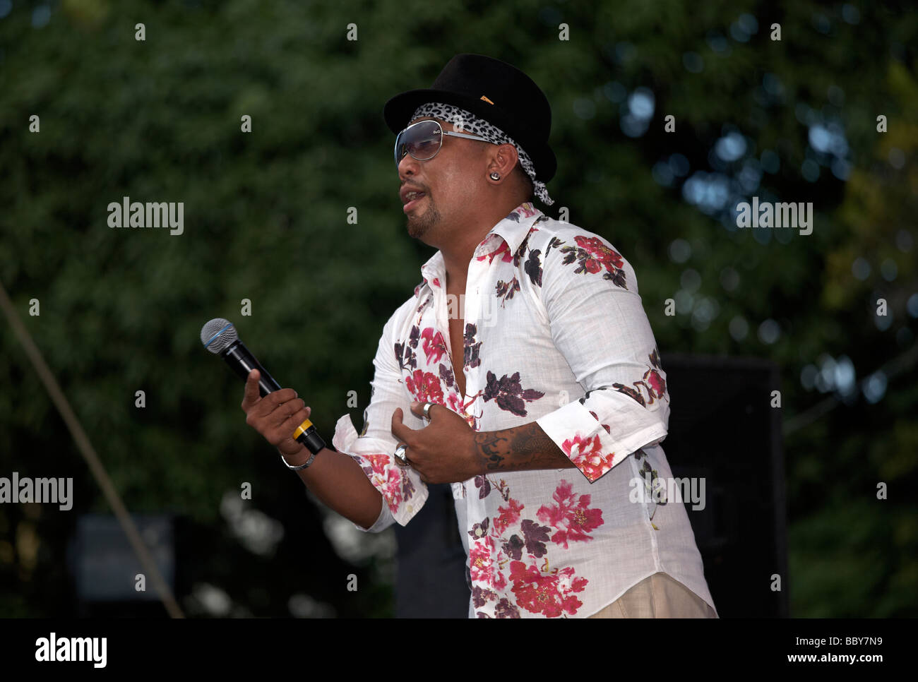 Individual male singer of the Noon Bossa Nova band performing on stage ...