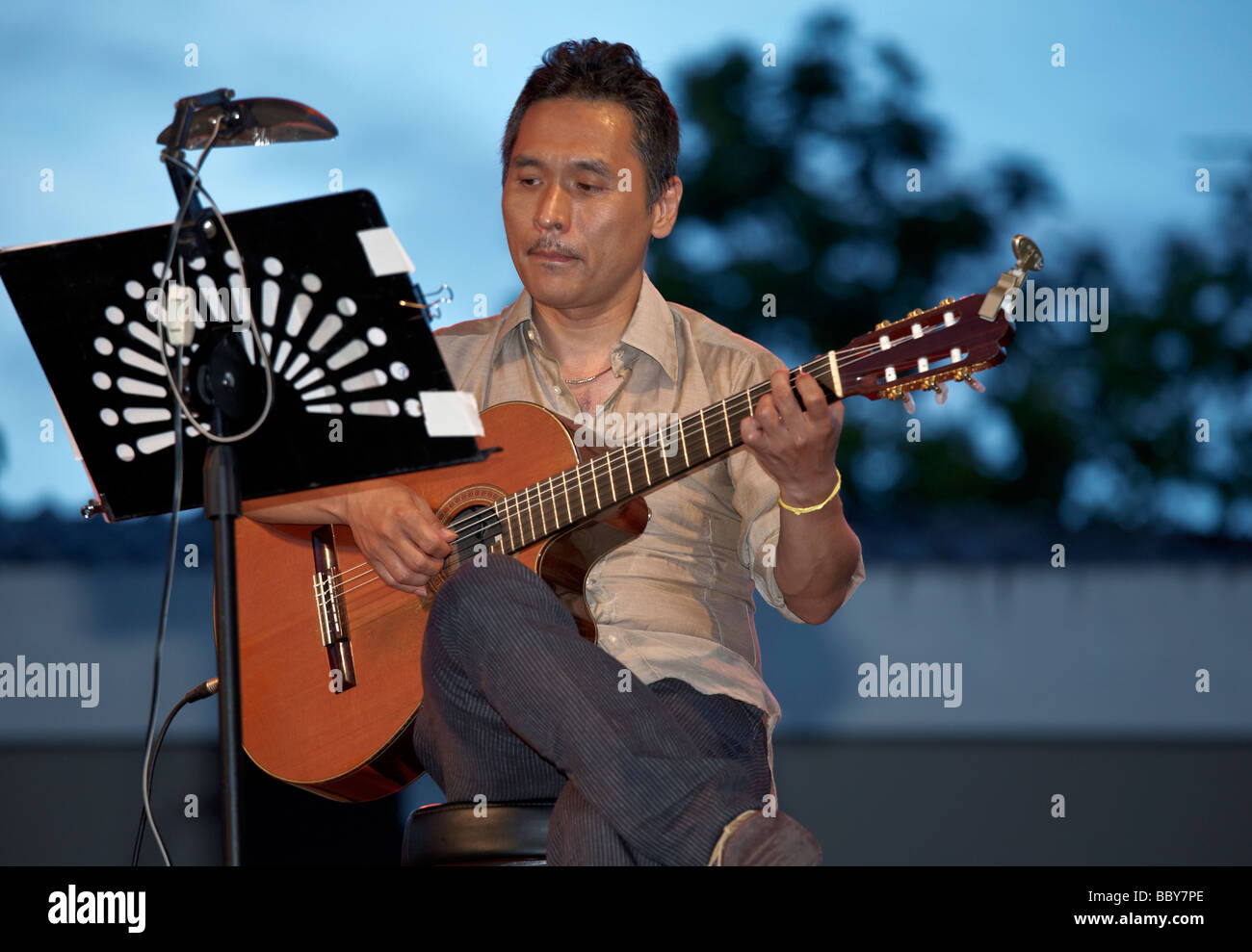 Classical guitarist performing on stage at the Hua Hin jazz festival ...