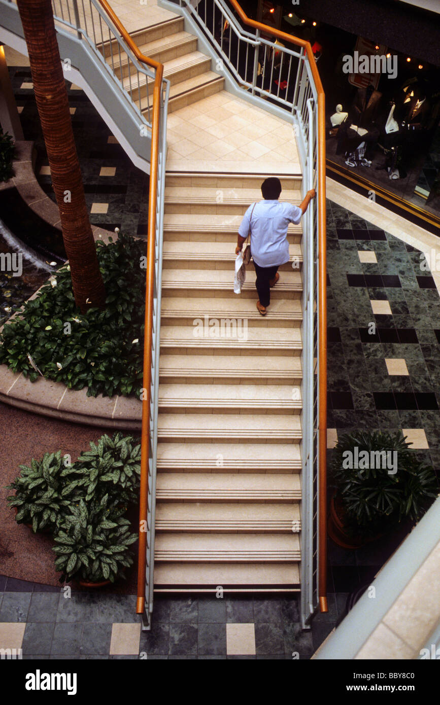 stair shopping mall steps customer man climb rise up walk second level ...