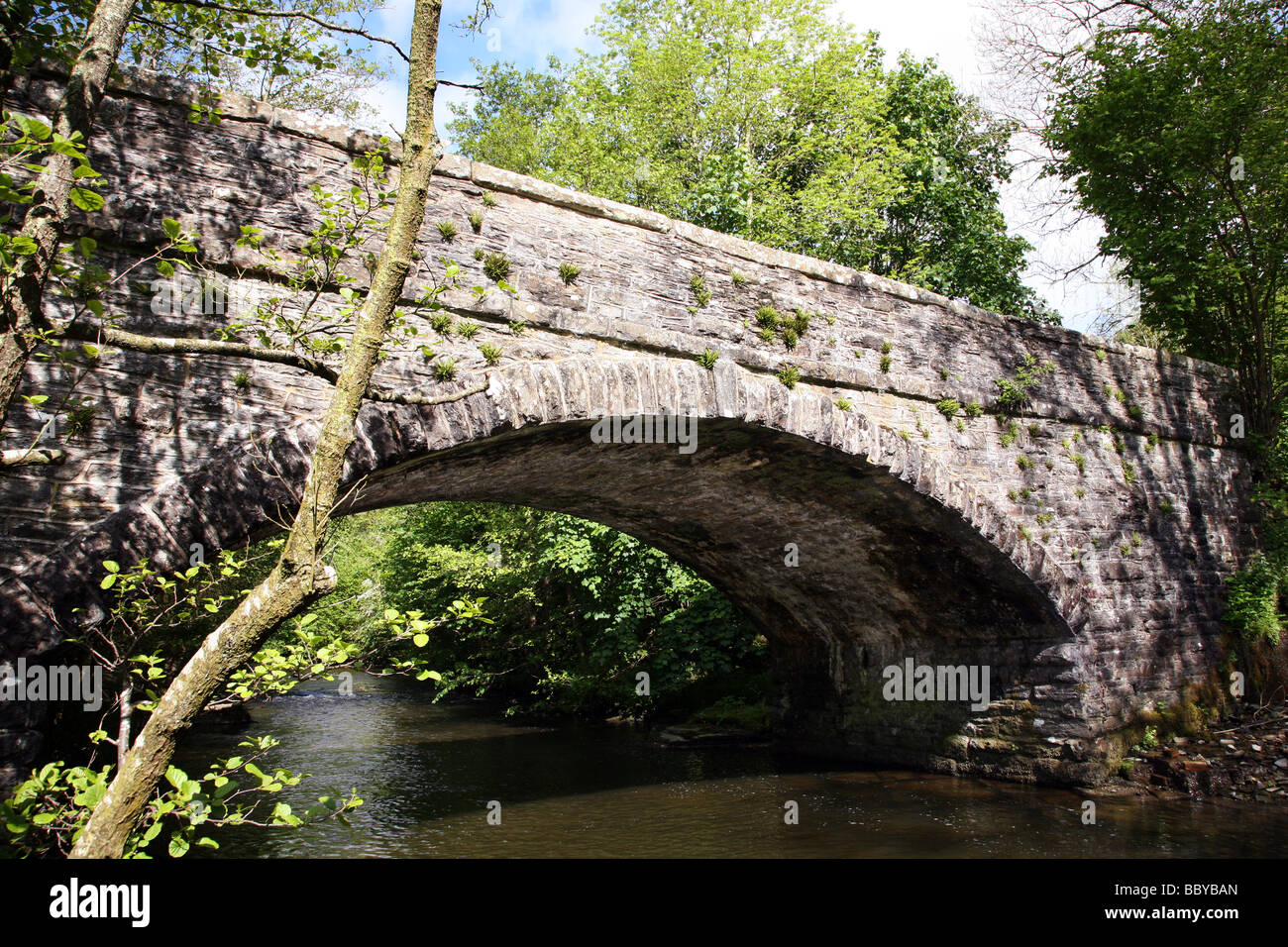 Stone bridge crossing a tributary of the River Wye near the Welsh ...