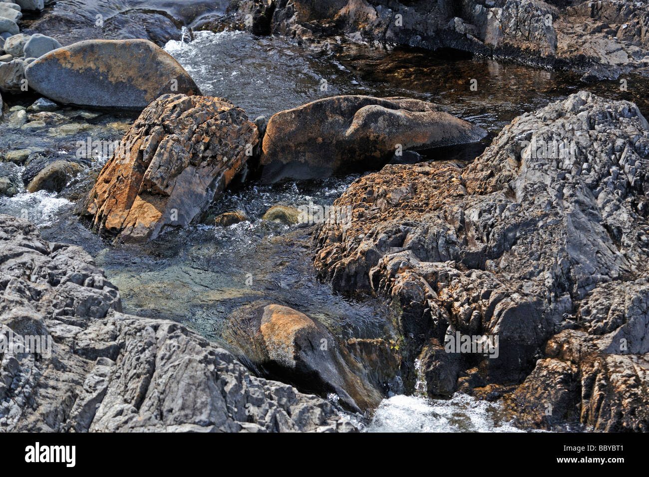 Rock formations. The Fairy Pools, Allt Coir' a' Mhadaidh, Coire na ...
