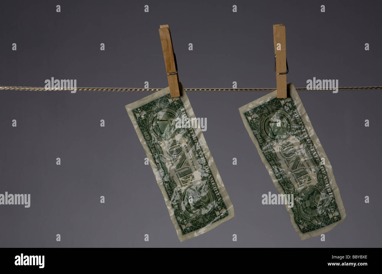 dollar bill on washing line Stock Photo - Alamy