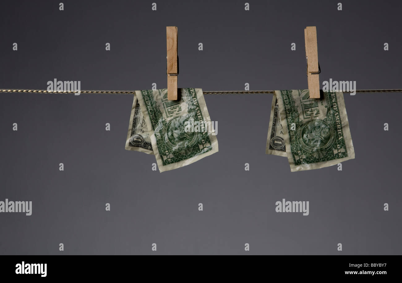 dollar bill on washing line Stock Photo - Alamy