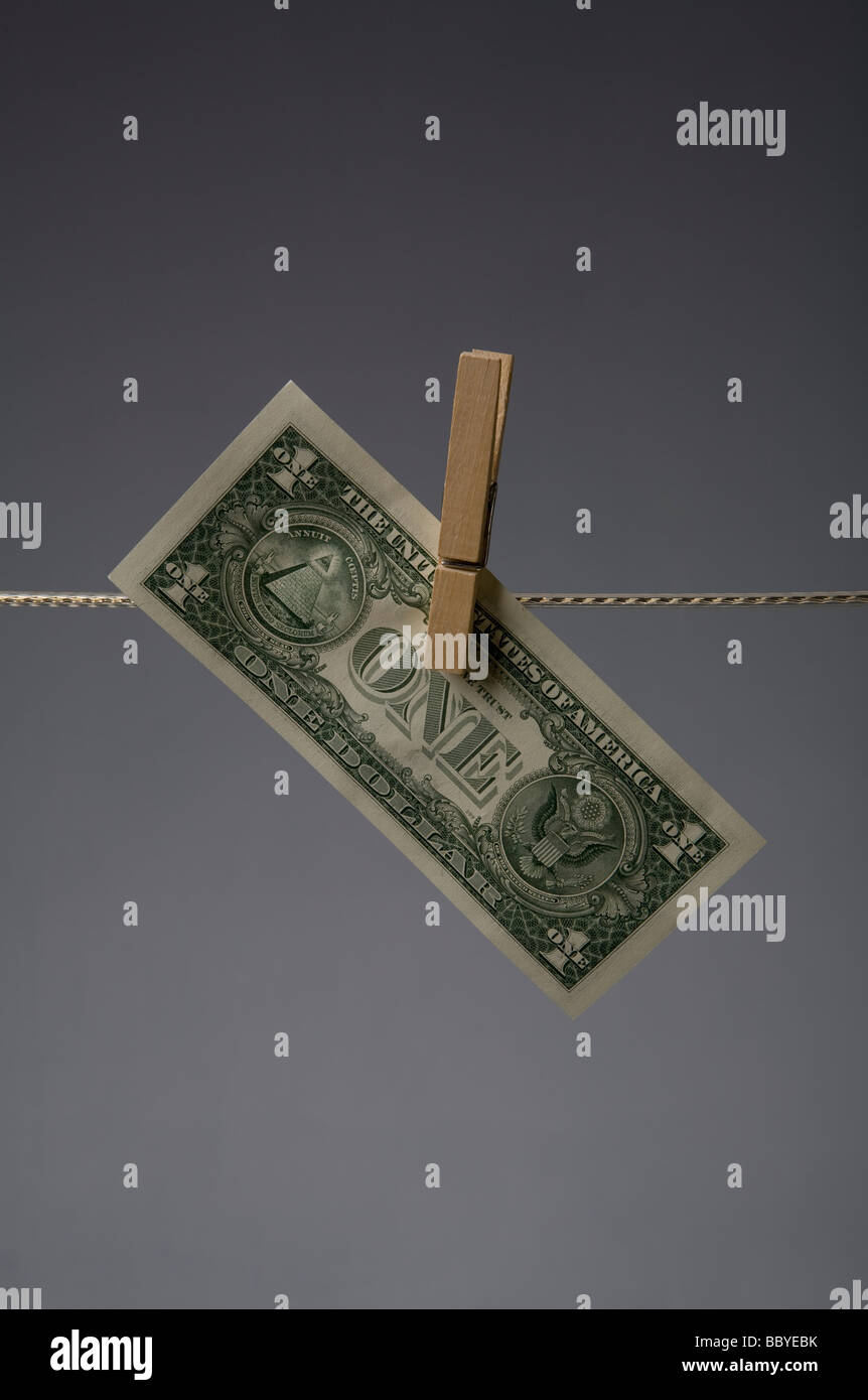 dollar bill on washing line Stock Photo - Alamy