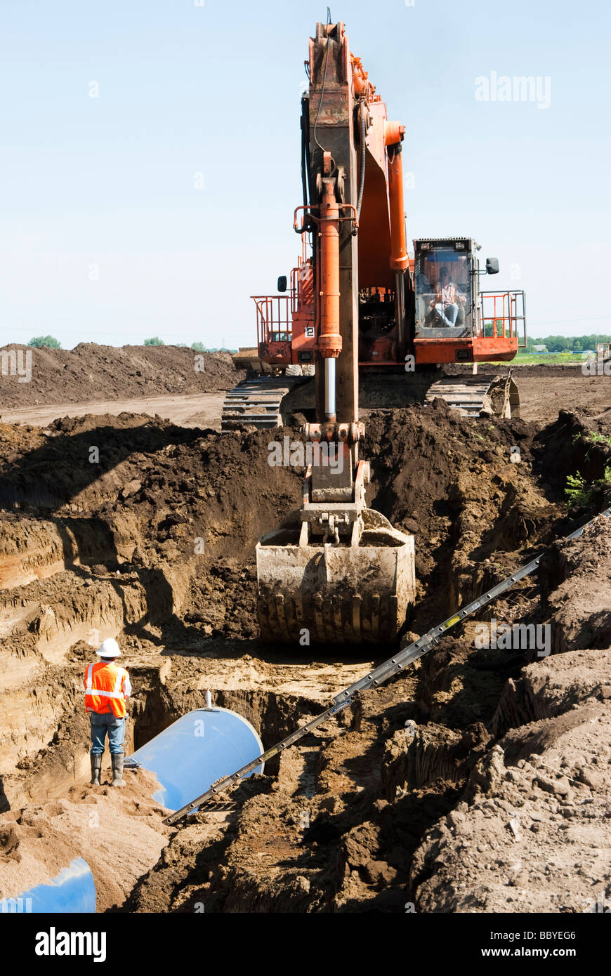 Water pipe being laid at the Louis Clark Regional Water System pipeline ...