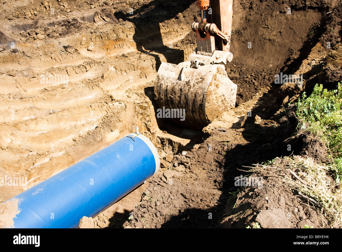 Water pipe being laid at the Louis Clark Regional Water System pipeline ...