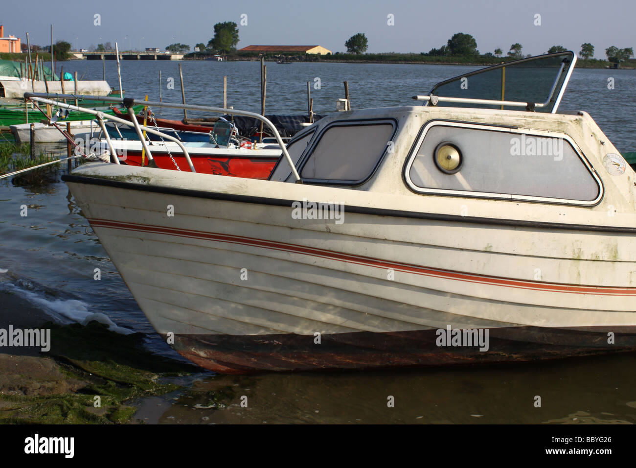 Boats in a lagoon, Albarella Island, Venice, Italy Stock Photo - Alamy