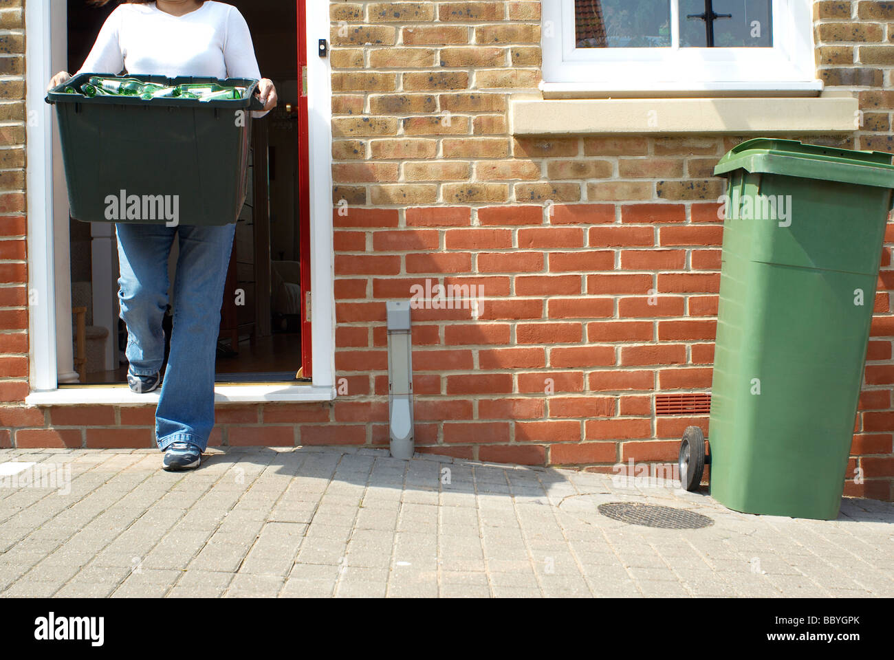 Putting rubbish bin out hi-res stock photography and images - Alamy